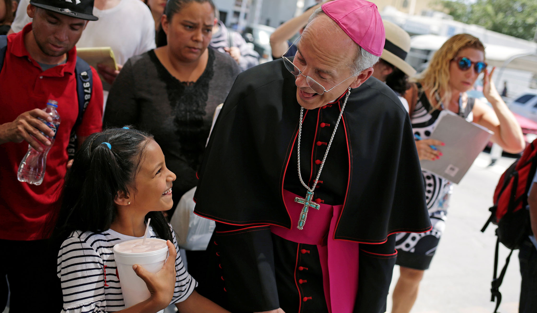 Mark Seitz & Migrants -- Catholic Bishop Escorts Migrants over Border ...