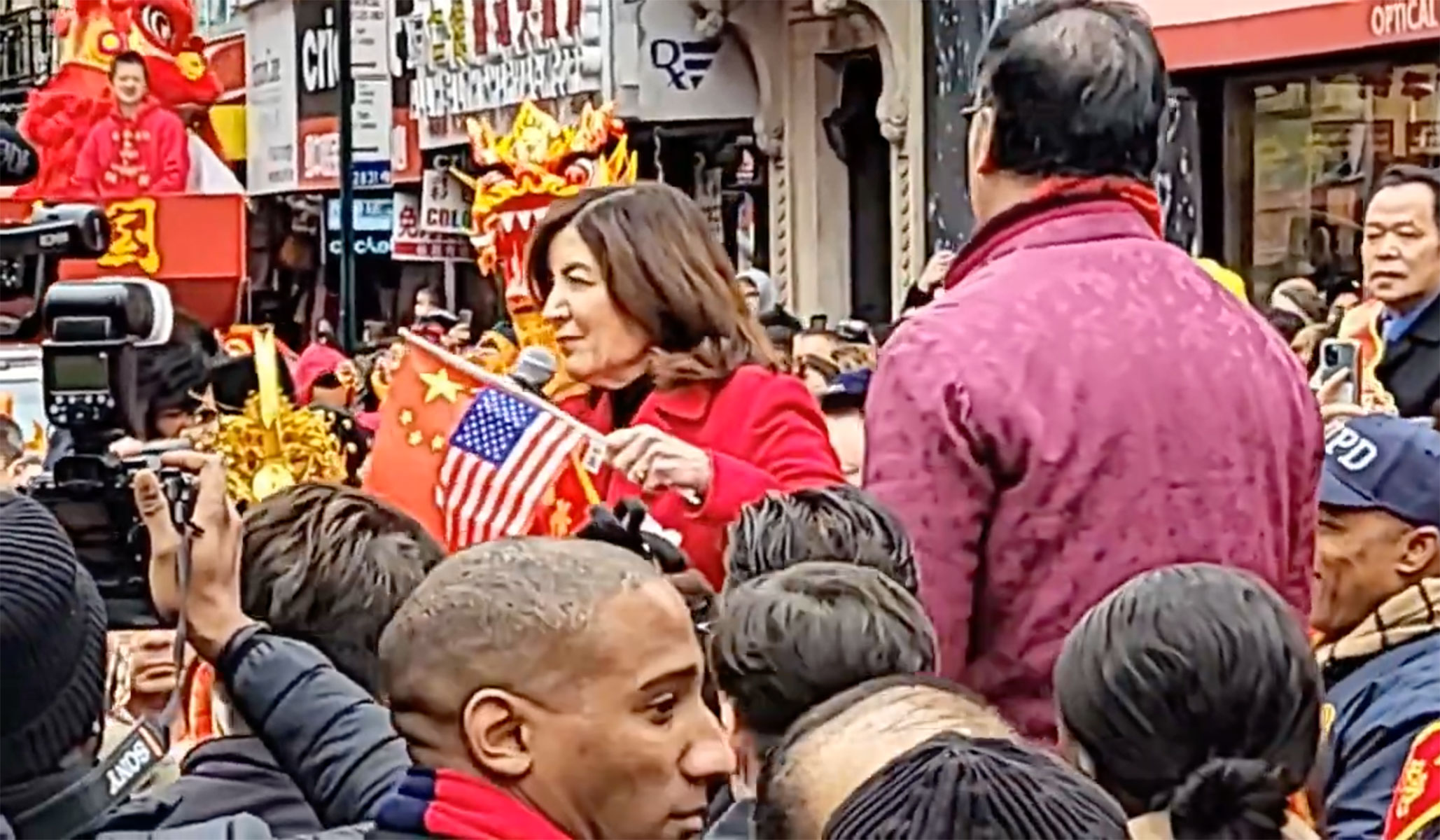 Kathy Hochul Caught on Camera Waving Chinese Flag, Marching Next to CCP ...